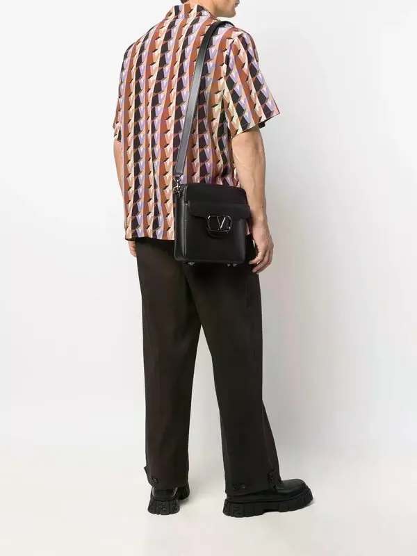 Valentino Garavani Vlogo Leather Messenger Bag