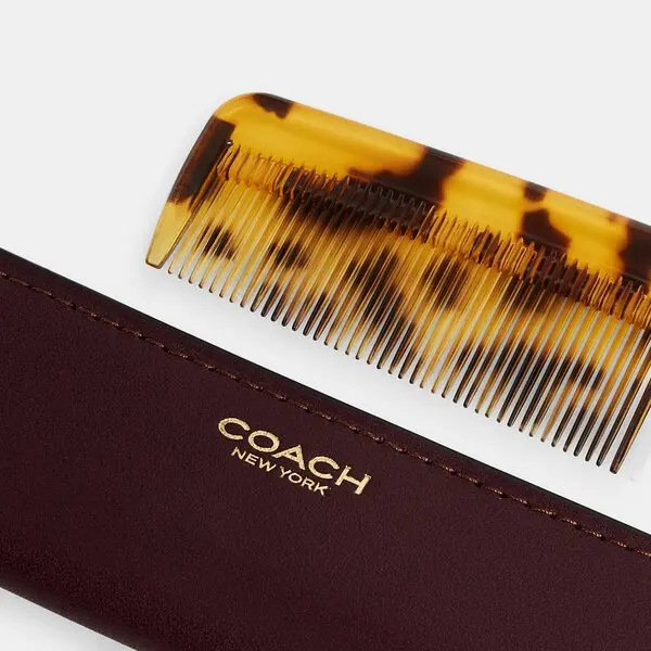 COACH Comb With Leather Sleeve