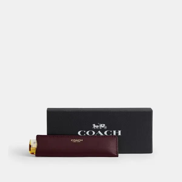 COACH Comb With Leather Sleeve