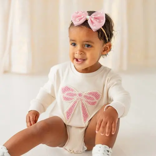 SWEET WINK Pearl Bow Patch Long Sleeve Romper