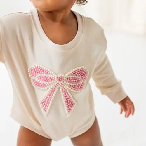 SWEET WINK Pearl Bow Patch Long Sleeve Romper