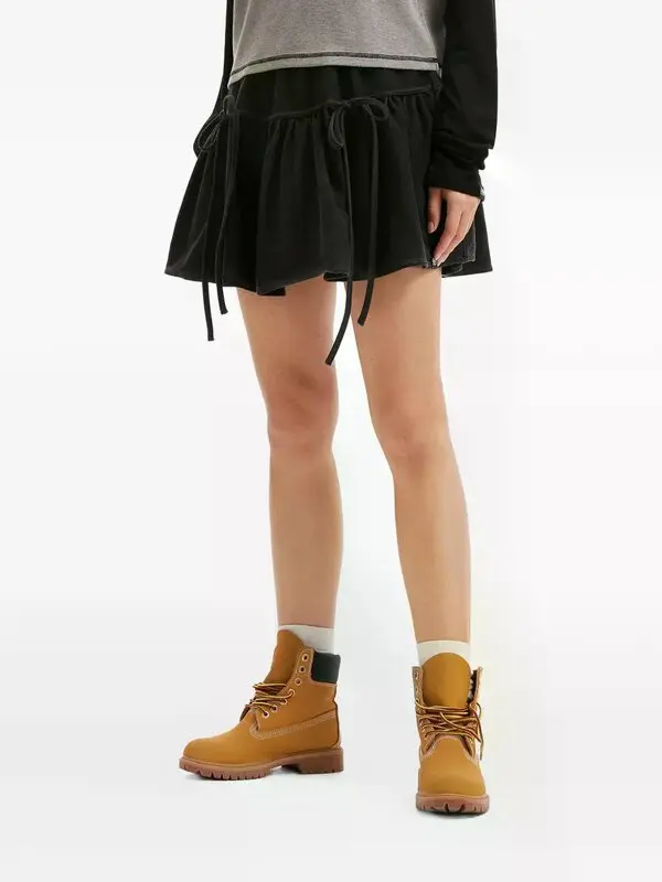 MINI CREAM Tiered Mini Skirt With Tie Detail