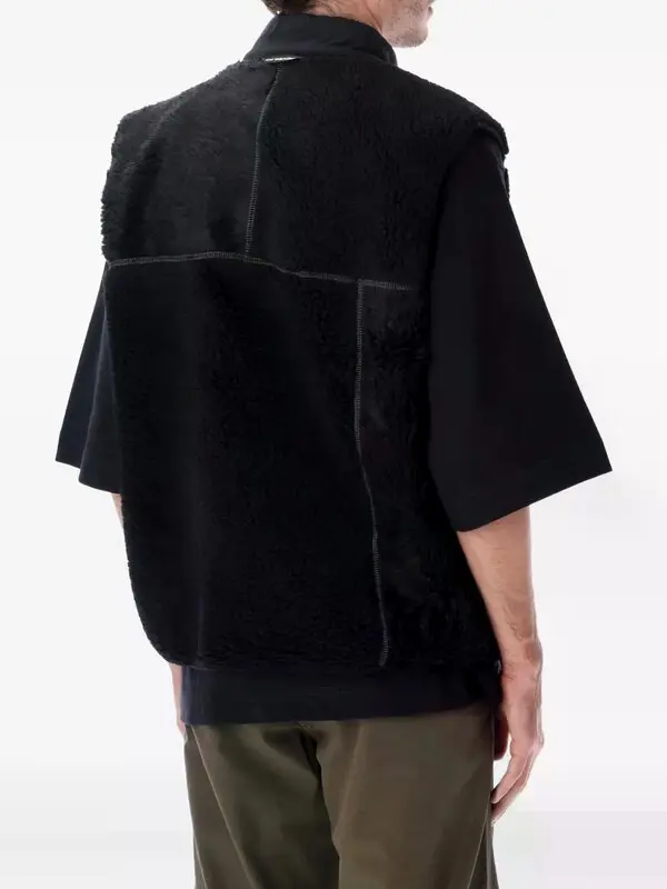 AND WANDER Sleeveless Gilet