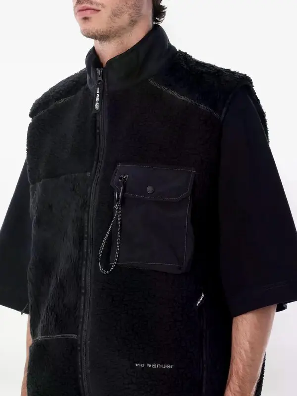 AND WANDER Sleeveless Gilet