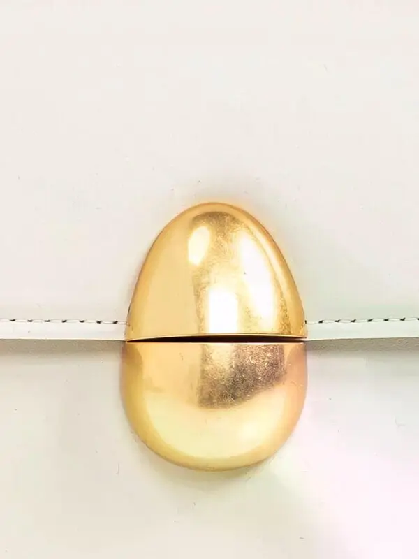 NEOUS Phoenix Clutch Bag