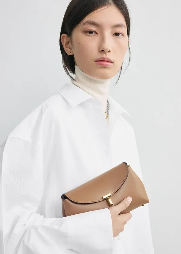 TOTEME Mini T-lock Leather Clutch - Beige