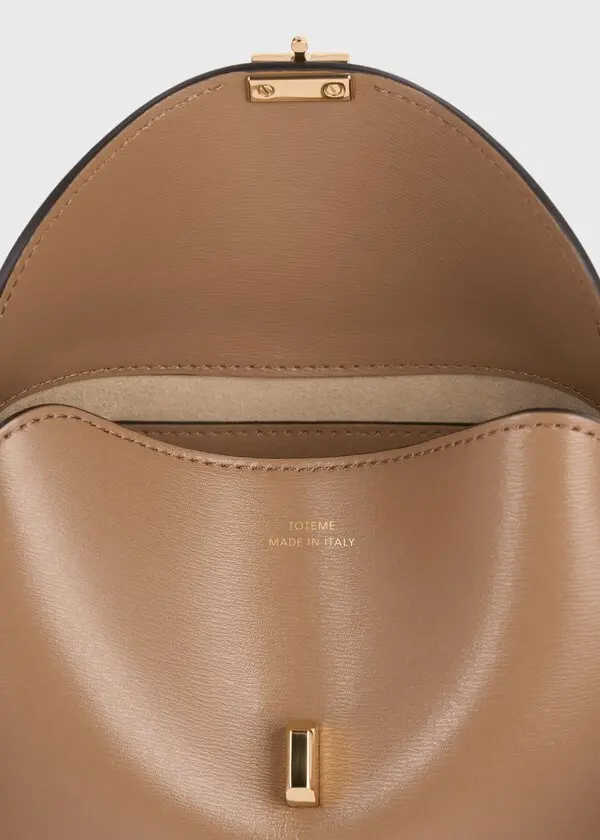 TOTEME Mini T-lock Leather Clutch - Beige