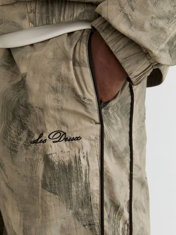 LES DEUX Abstract Print Technical Track Trousers
