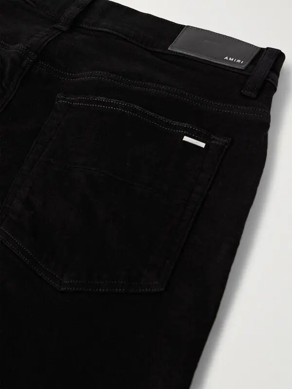 Amiri Mx1 Skinny-fit Leather-paneled Distressed Jeans