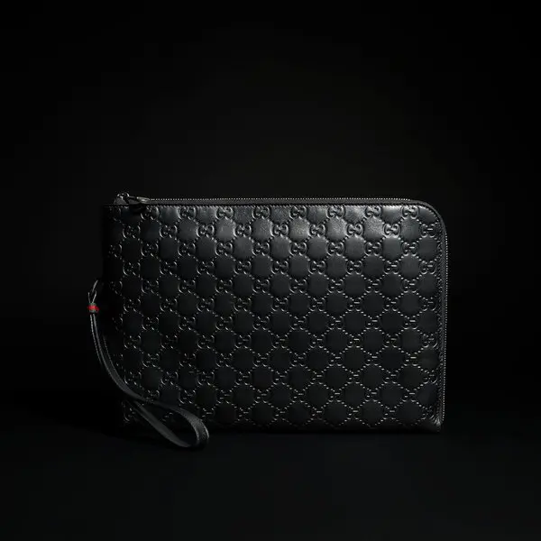 Gucci Gg Embossed Leather Medium Pouch