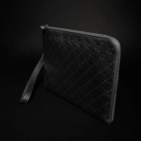 Gucci Gg Embossed Leather Medium Pouch
