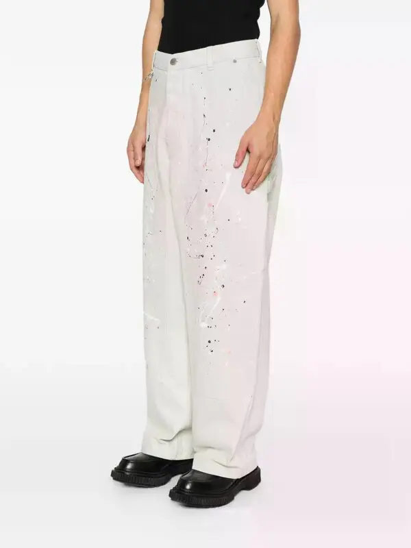 ÉTUDES STUDIO Paint-splatter Carpenter Jeans