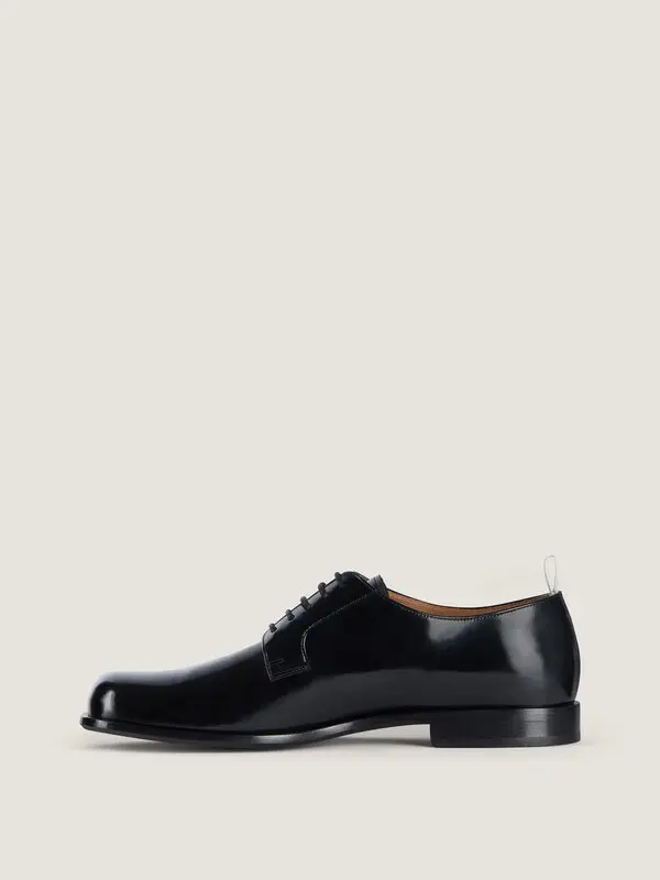 Givenchy Tux Derbies In Brushed Leather