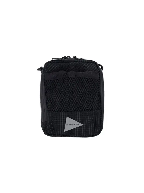 AND WANDER Reflective Crossbody Pouch Bag