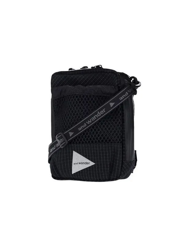 AND WANDER Reflective Crossbody Pouch Bag
