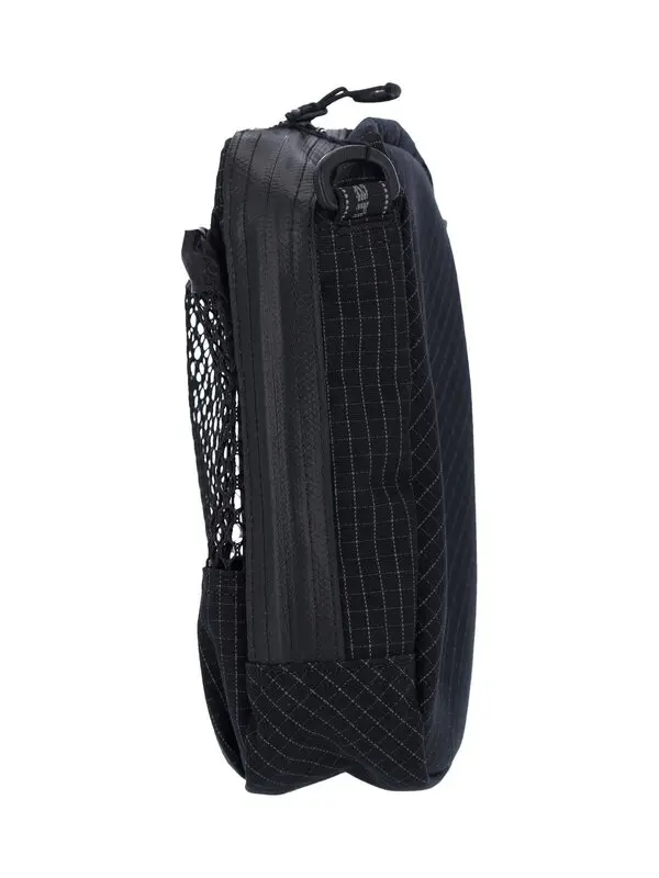 AND WANDER Reflective Crossbody Pouch Bag