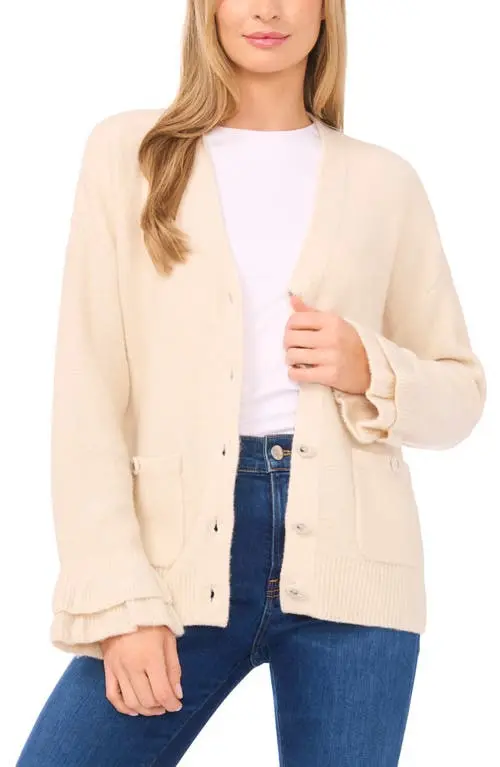 CECE DUPRAZ Ruffle Cuff Longline Cardigan