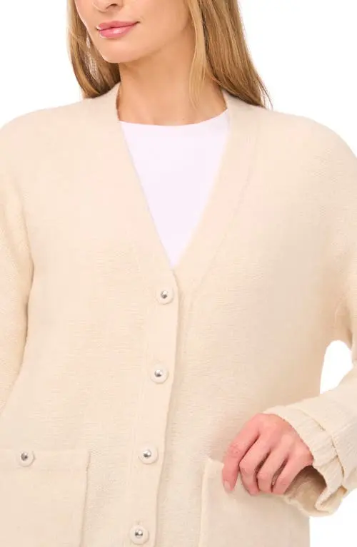 CECE DUPRAZ Ruffle Cuff Longline Cardigan