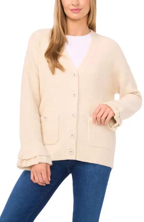 CECE DUPRAZ Ruffle Cuff Longline Cardigan