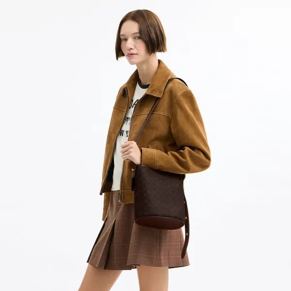 COACH Bleecker Bucket Bag 21 In Signature Canvas - Brass/maple