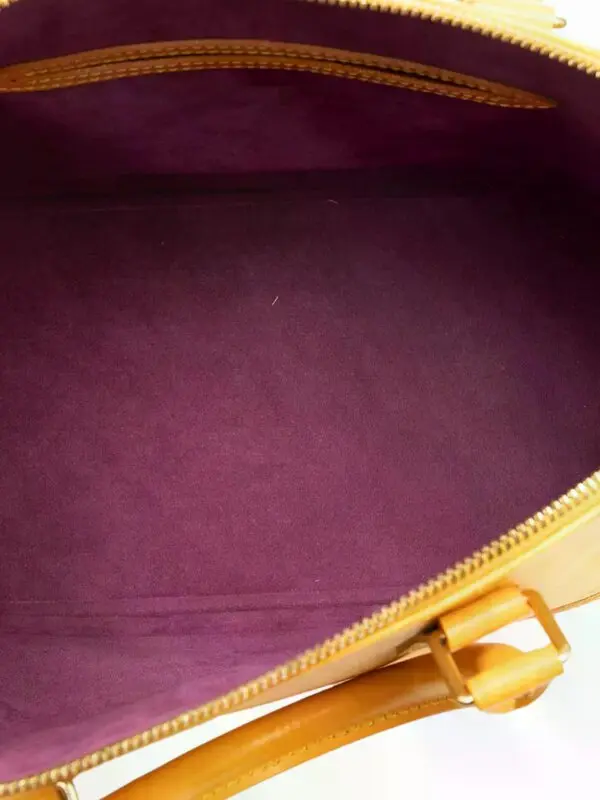 LOUIS VUITTON Epi Alma Pm Handbag