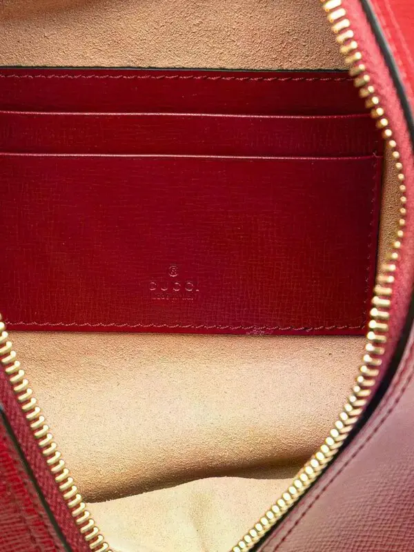 Gucci Leather Interlocking G Oval Clutch Bag