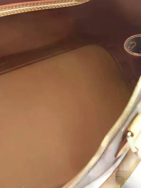 LOUIS VUITTON Alma Pm Monogram Handbag - Brown