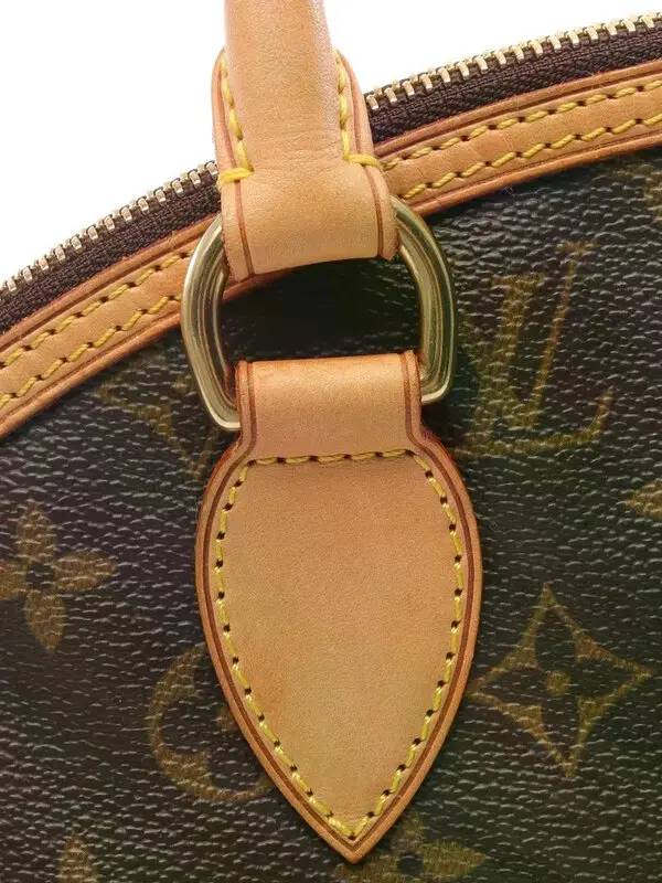 LOUIS VUITTON 2006 Lockit Monogram Handbag