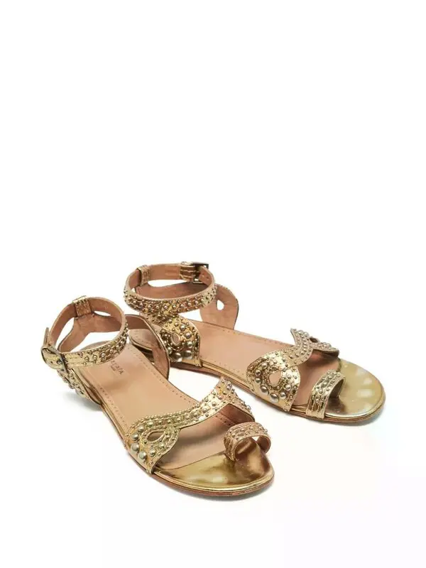 Alaïa Metallic Flat Sandals