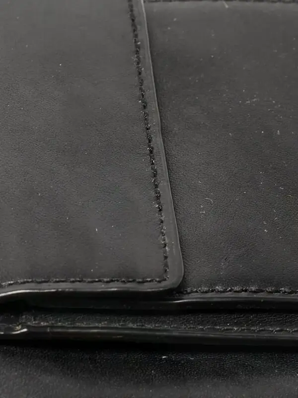 COACH® Logo-embossed Leather Wallet