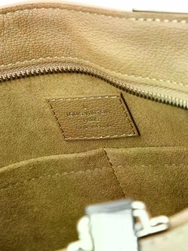 LOUIS VUITTON Zipped Monogram Leather Tote Bag