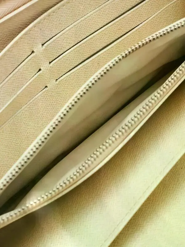 LOUIS VUITTON Zippy Leather Wallet