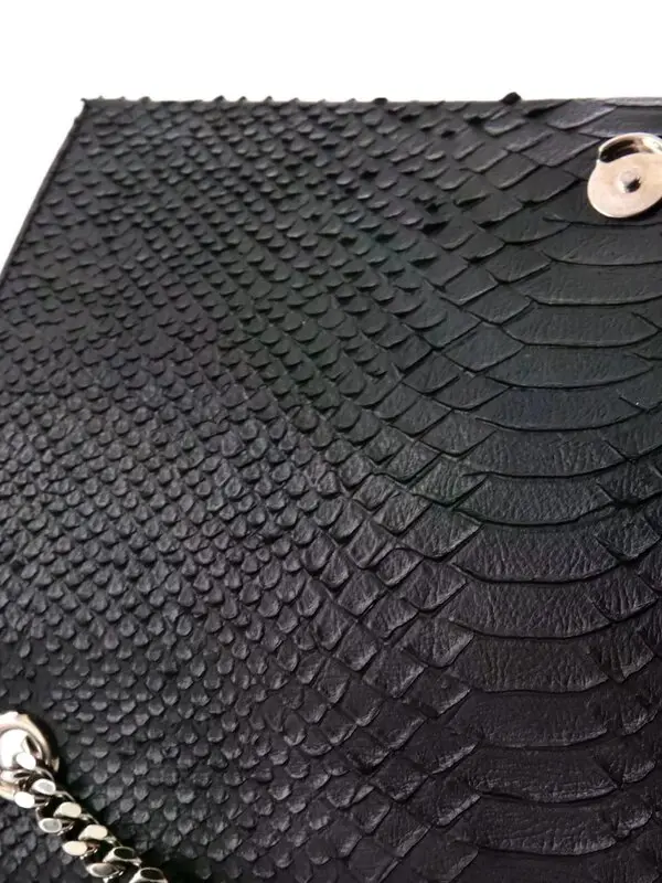 Saint Laurent Monogram Tassel Embossed Leather Crossbody Bag