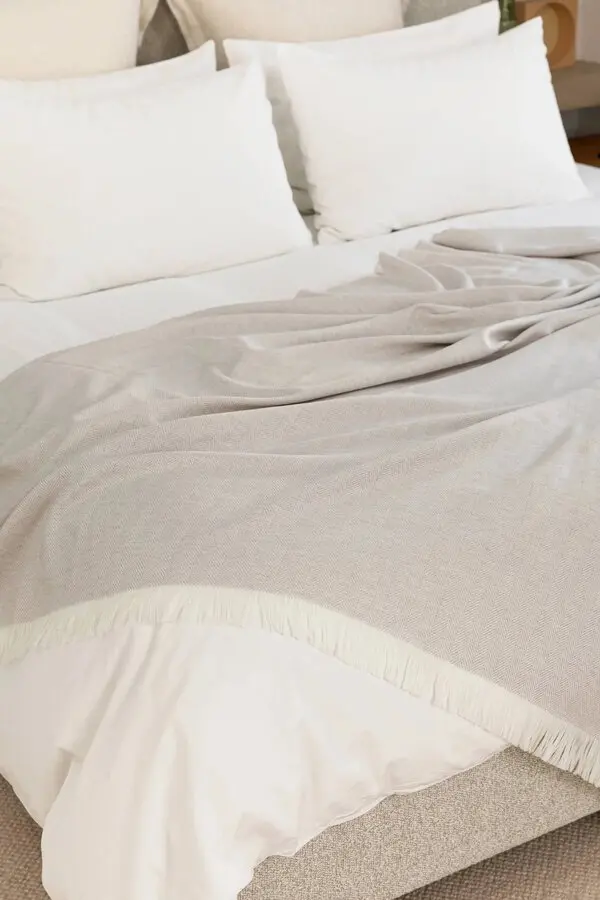 Johnstons Of Elgin Herringbone Merino Bed Throw In Silver Birch