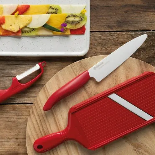 KYOCERA Advanced Ceramic Vertical Double Edge Blade Vegetable Peeler - Red