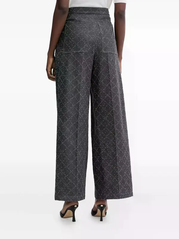 SIMONA CORSELLINI Pleated Patterned Trousers