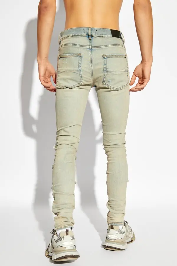 Amiri Distressed Skinny Jeans
