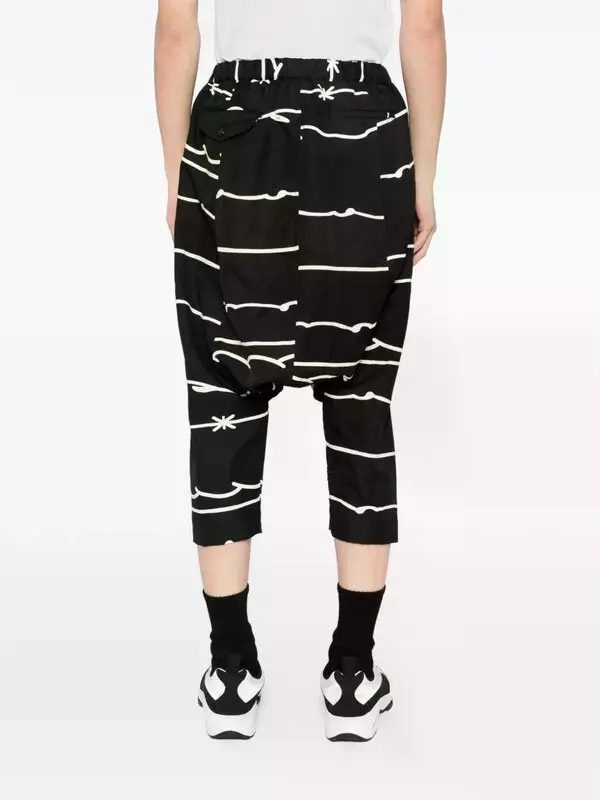 BLACK COMME DES GARÇONS Printed Trousers