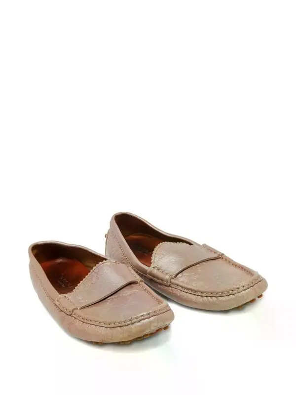 Gucci Embossed Leather Loafers
