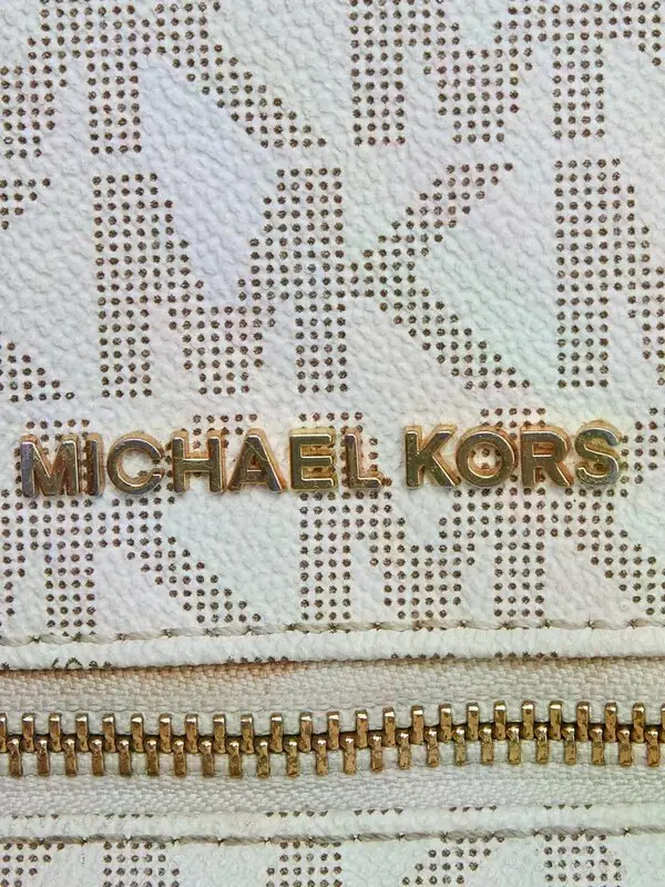 Michael Kors Monogram Leather Backpack