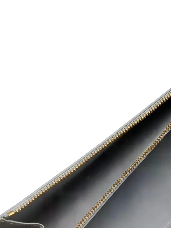 LOUIS VUITTON Monogram-debossed Leather Wallet