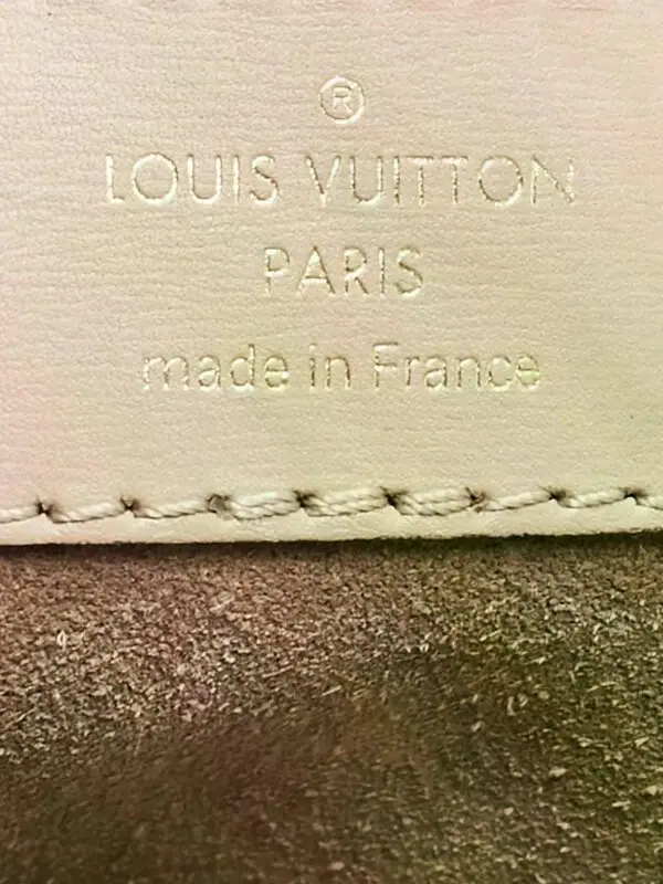 LOUIS VUITTON Monogram-embossed Leather Handbag