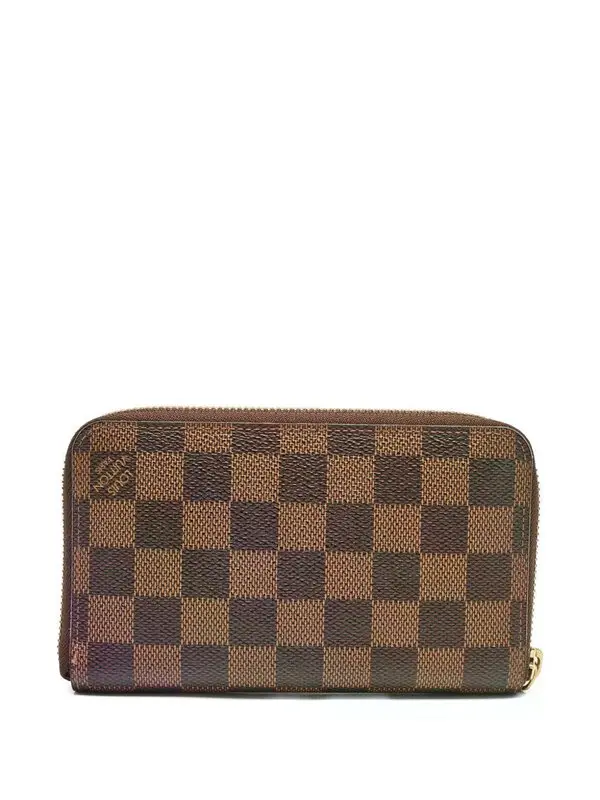 LOUIS VUITTON 2010 Damier Ebene Zip-around Wallet - Brown