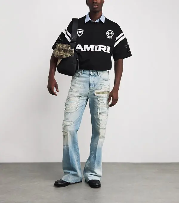 Amiri Repaired Bootcut Jeans