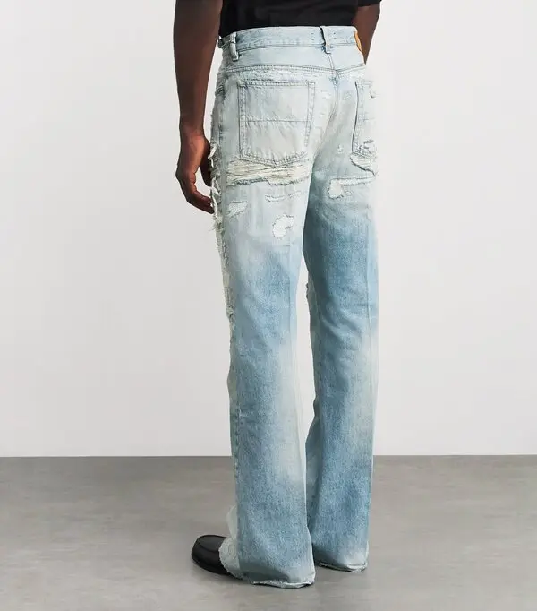 Amiri Repaired Bootcut Jeans