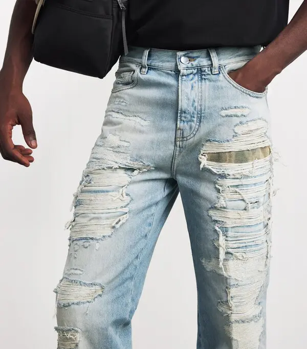 Amiri Repaired Bootcut Jeans