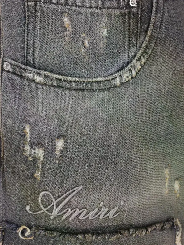 Amiri Distressed Patchwork Jeans