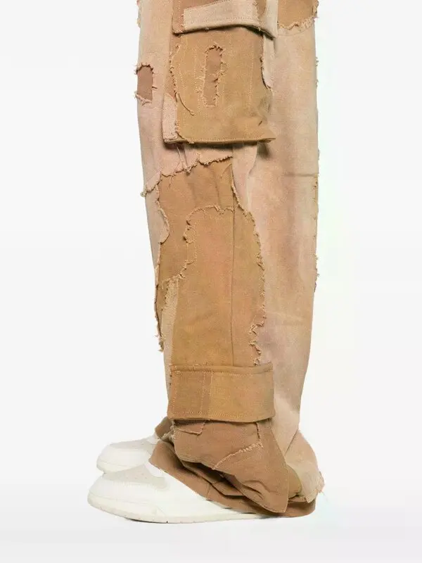 WHO DECIDES WAR Patchwork Buttoned Jeans