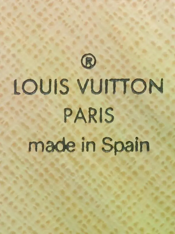 LOUIS VUITTON Patterned-canvas Wallet