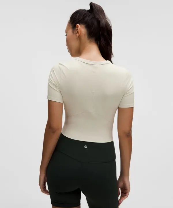 Lululemon Cropped Nulu Twist-hem Short-sleeve Shirt - Bone